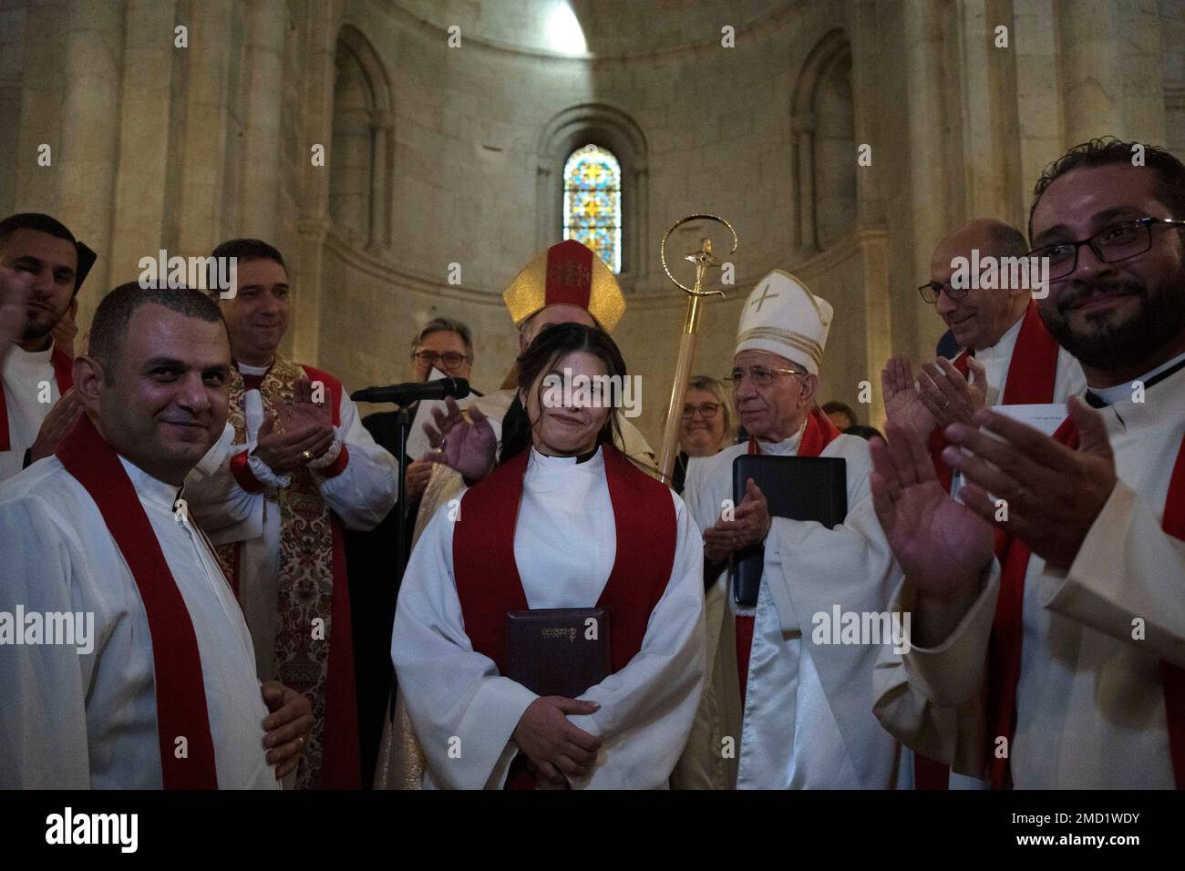 Sally Ibrahim Azar, center, a Palestinian Christian and Council member ...