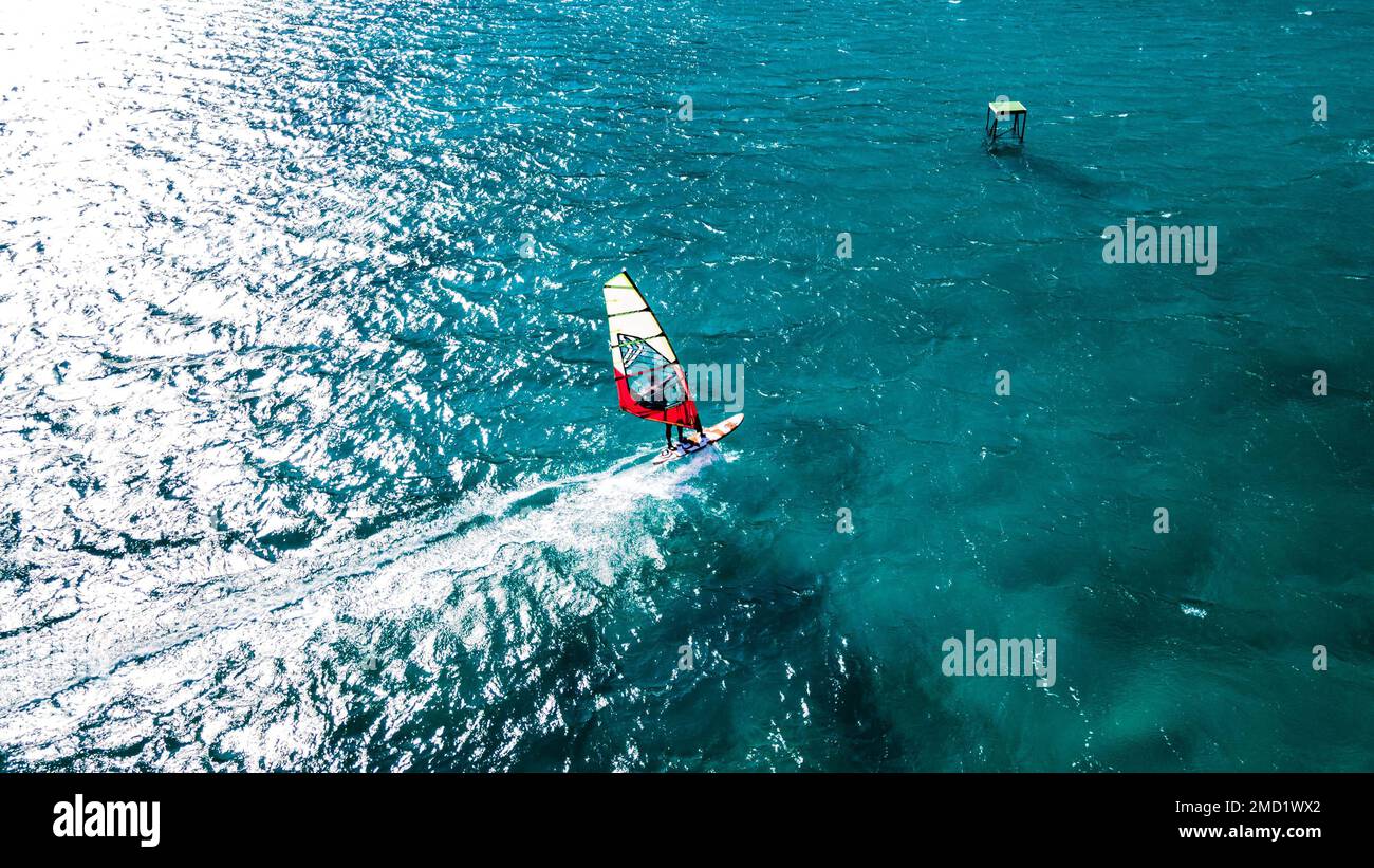 An aerial view of the windsurfer in the sea Stock Photo - Alamy