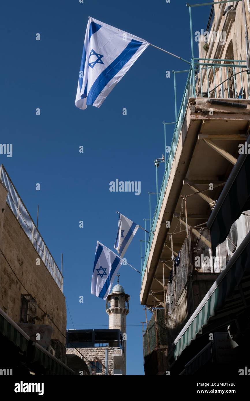 Israeli flags hanging from a house Jewish settlers took over in Al Wad ...