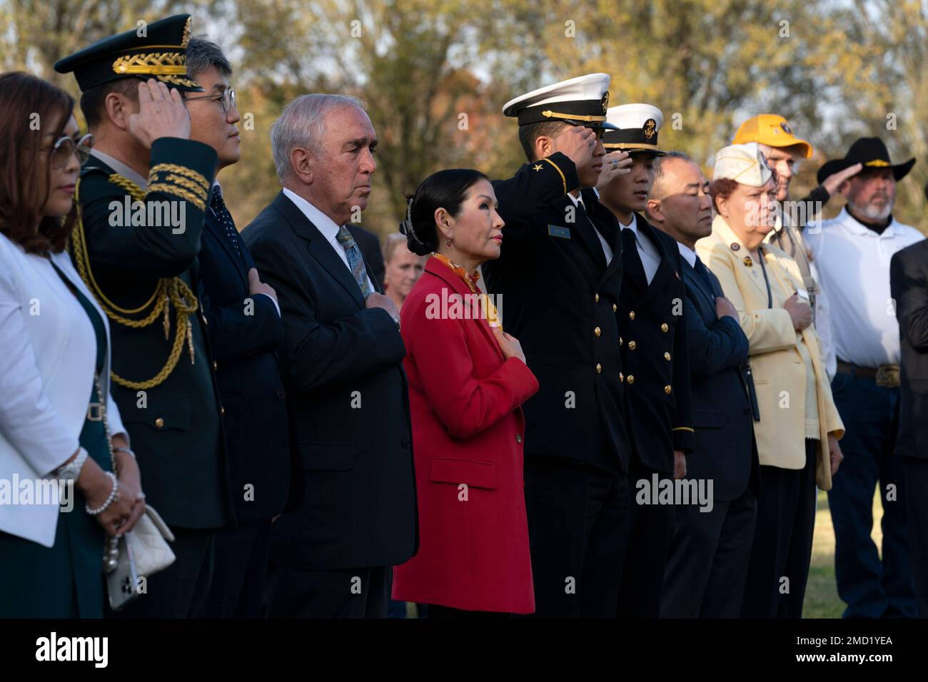 Maryland first lady Yumi Hogan, center, along with others listen the ...