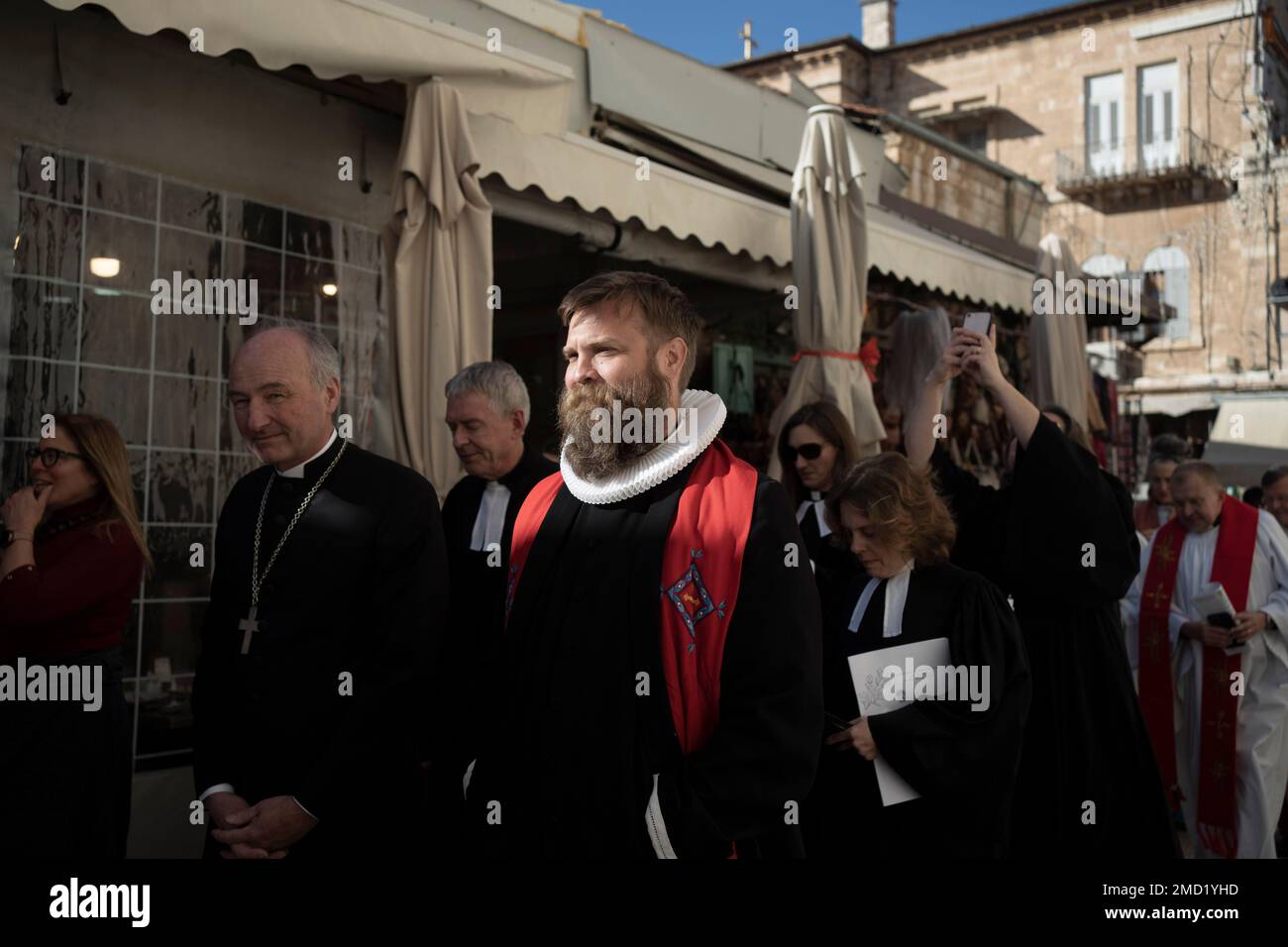 Lutheran Christian clergy walk in a procession for the ordination of ...