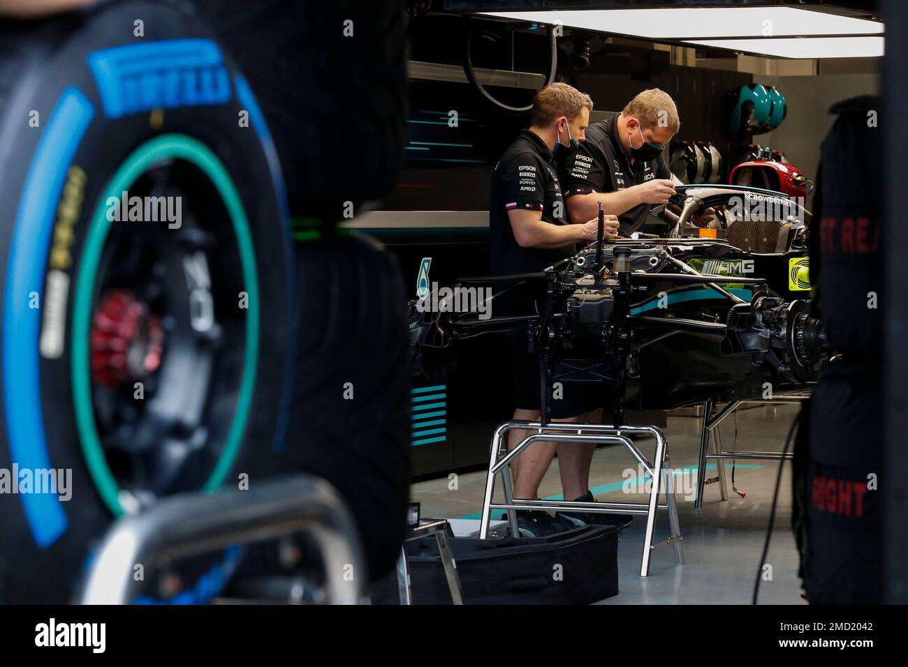 Mercedes pit crew prepare the car of driver Lewis Hamilton, of Britain ...