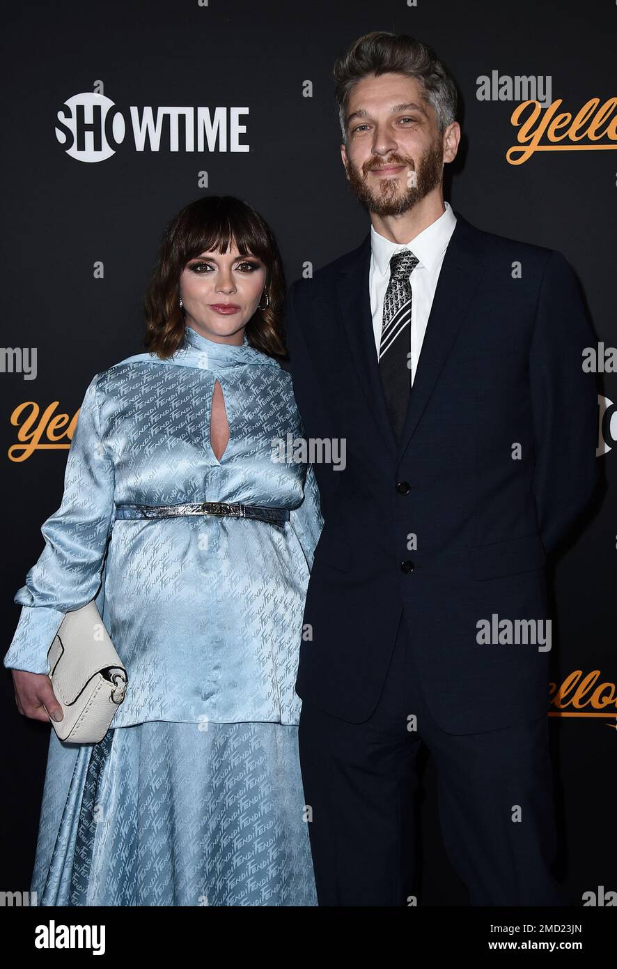 Christina Ricci, left, and Mark Hampton arrive at the premiere of ...