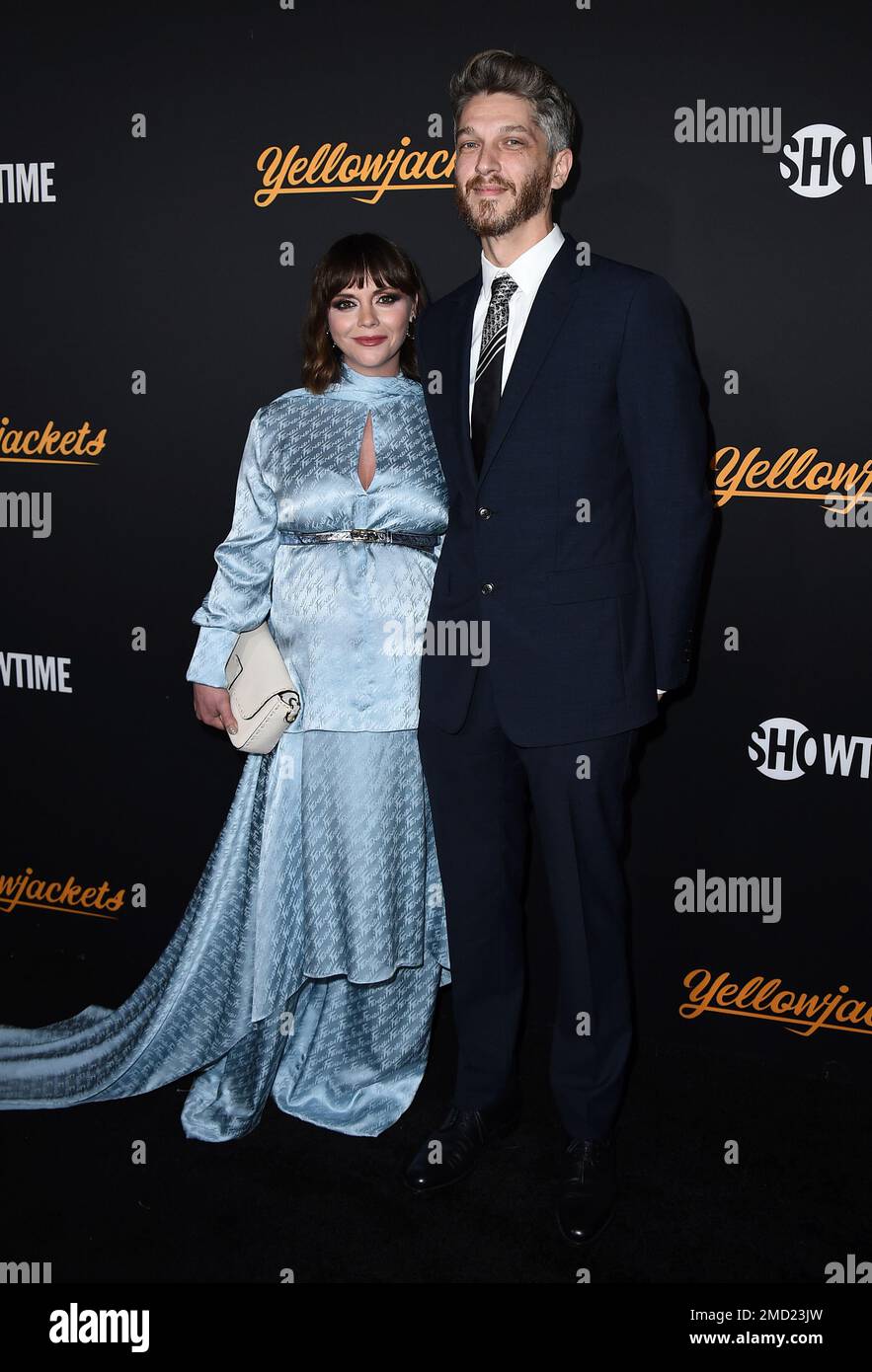 Christina Ricci, left, and Mark Hampton arrive at the premiere of ...