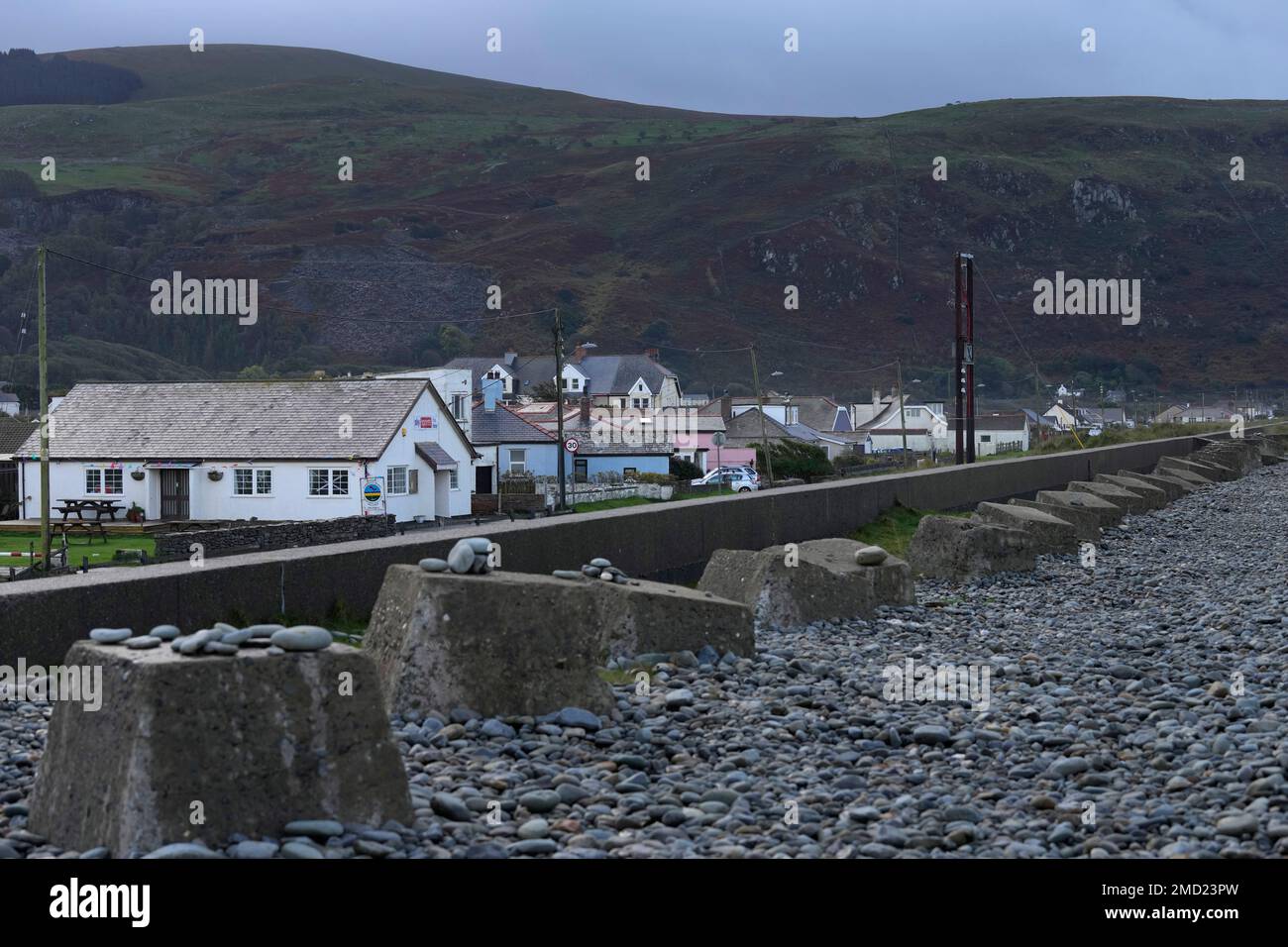 The sea defence wall behind the World War II anti tank defences along ...
