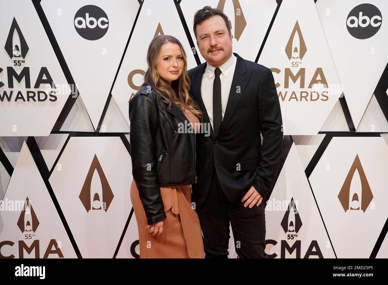 Travis Nicholson, right, and Jennie Alley arrive at the 55th annual CMA ...
