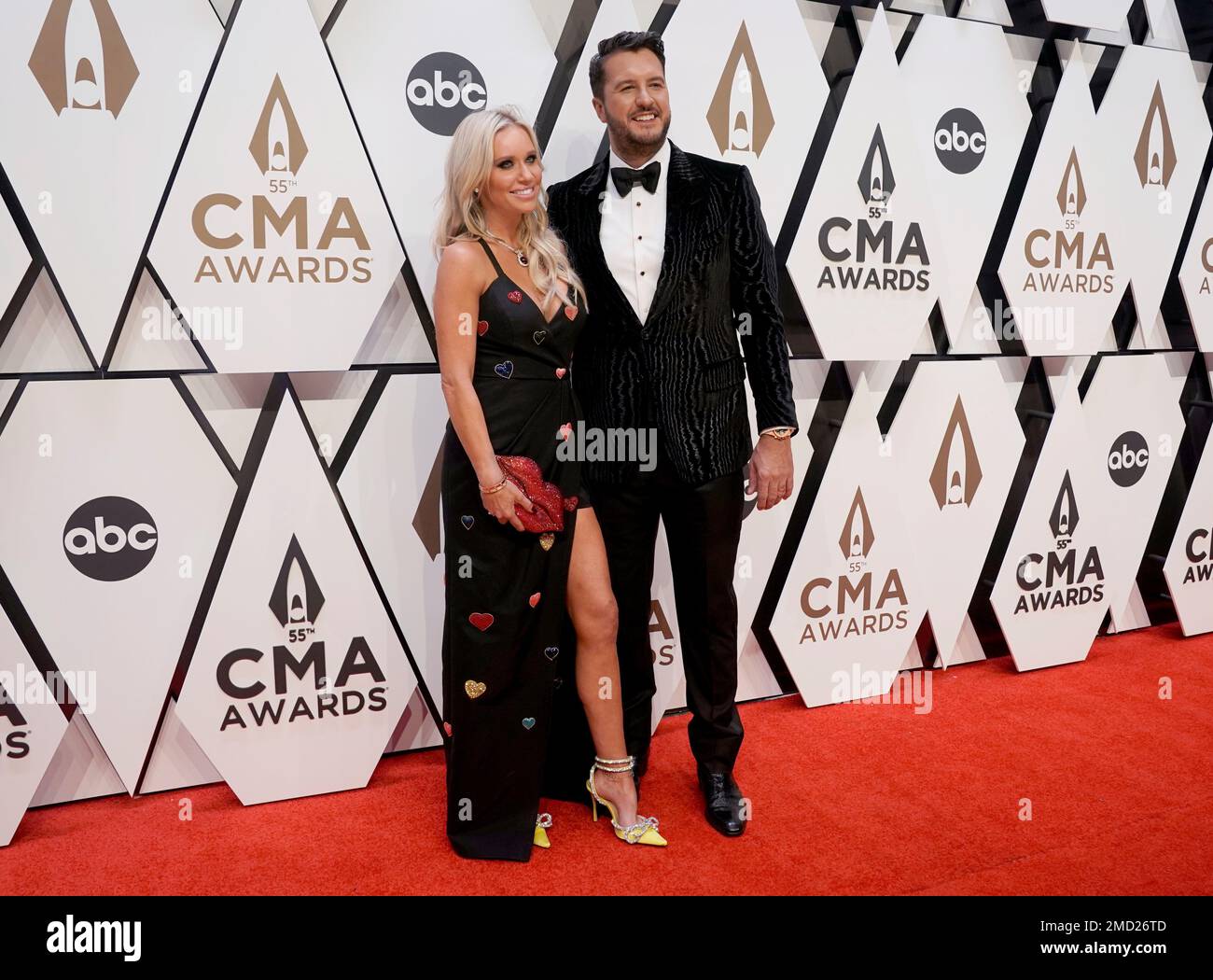 Luke Bryan, right, and Caroline Boyer arrives at the 55th annual CMA ...
