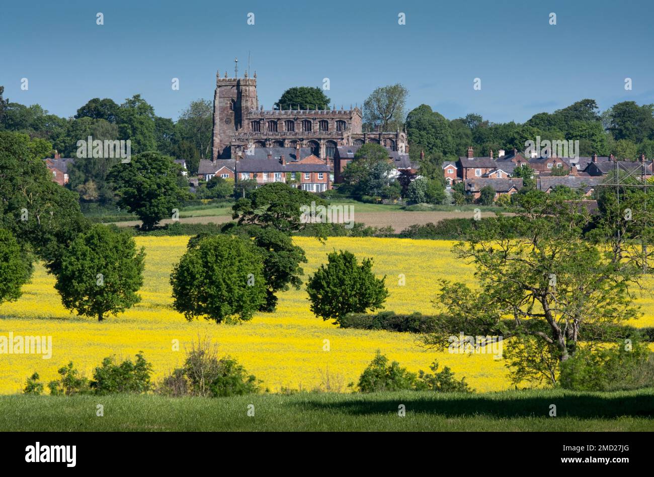 St Oswalds Church and the Village of Malpas in summer, Cheshire ...