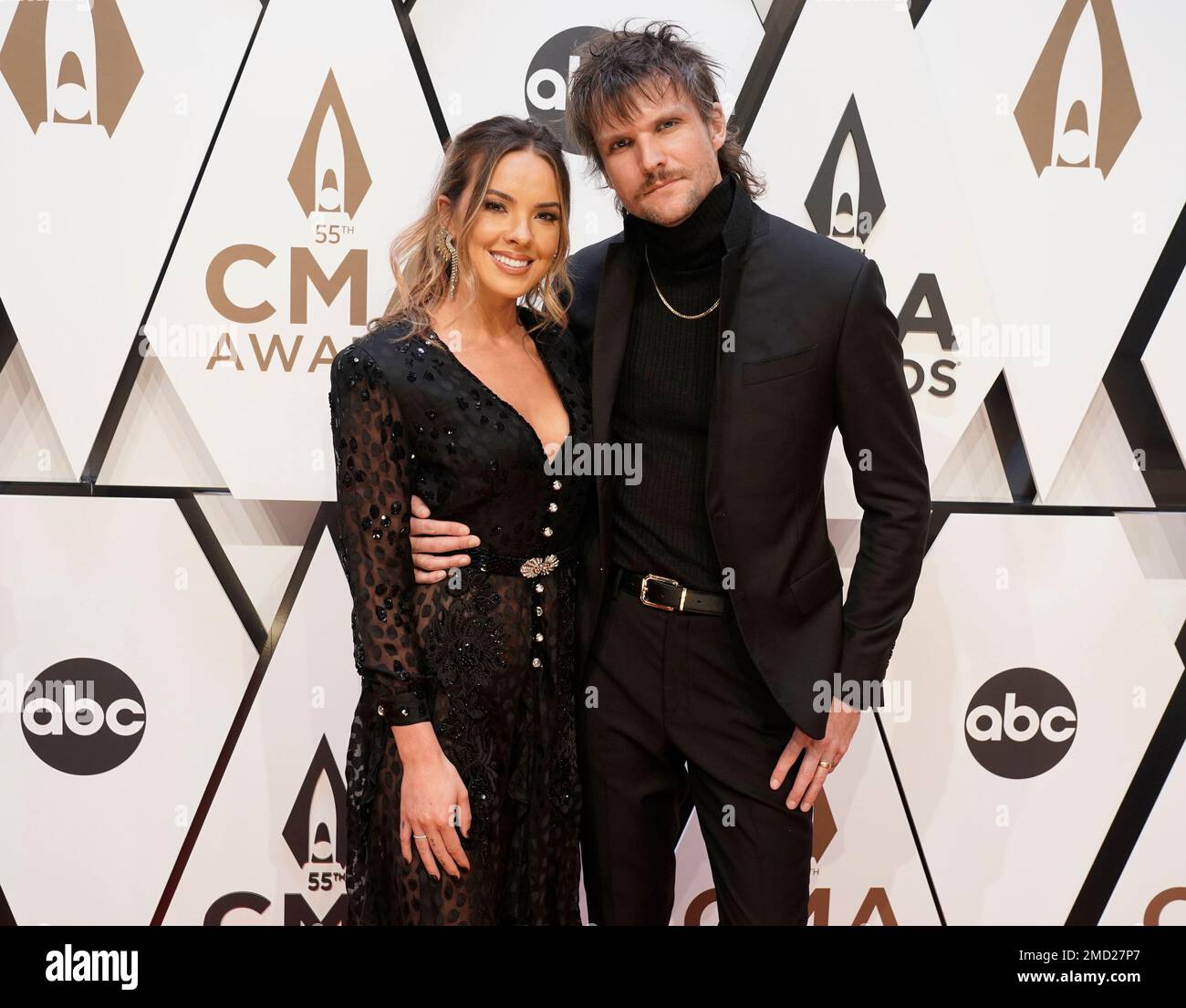 Martin Johnson, right, and Naomi Cooke arrive at the 55th annual CMA ...