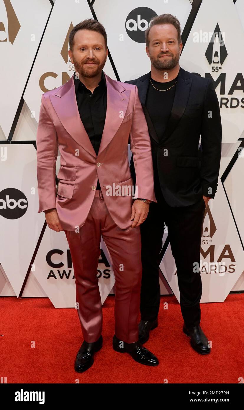 Shane McAnally, left, and Michael Baum arrive at the 55th annual CMA ...