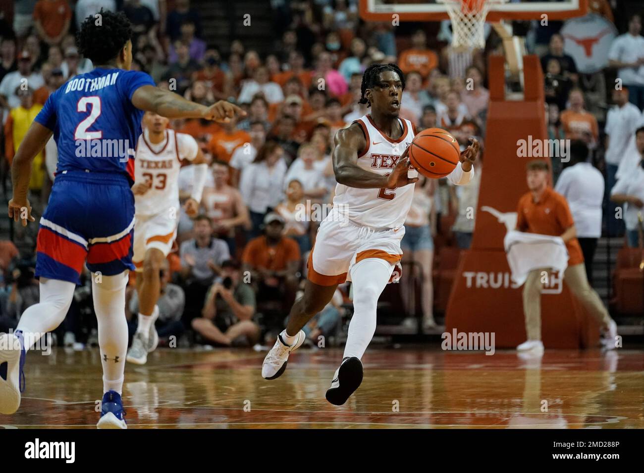 Texas guard Marcus Carr (2) drives against Houston Baptist during an ...