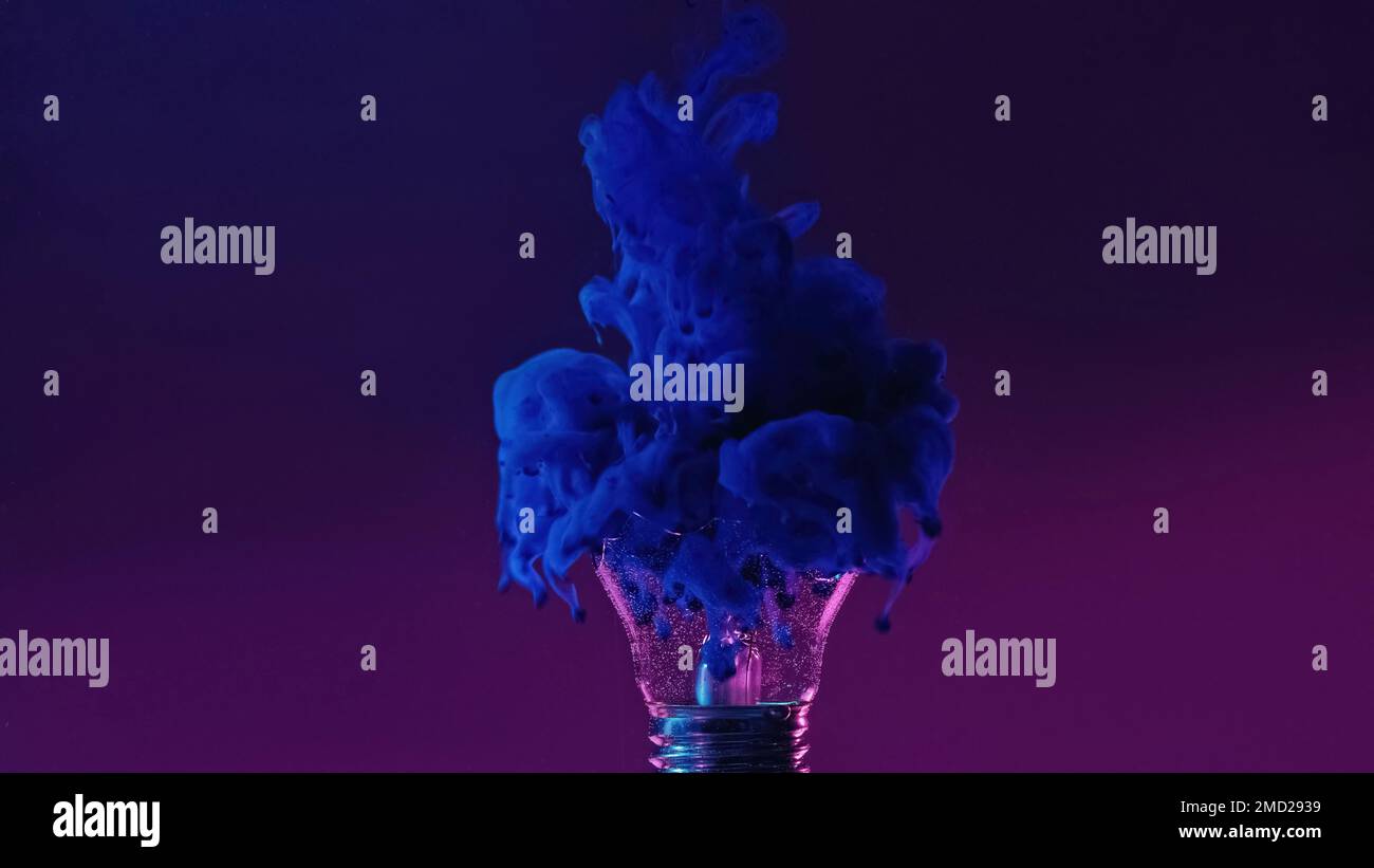 Ink shot in broken lamp neon background light bulb Stock Photo - Alamy