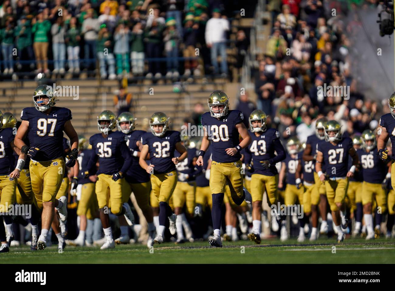 Notre Dame take the field beforean NCAA college football game against ...