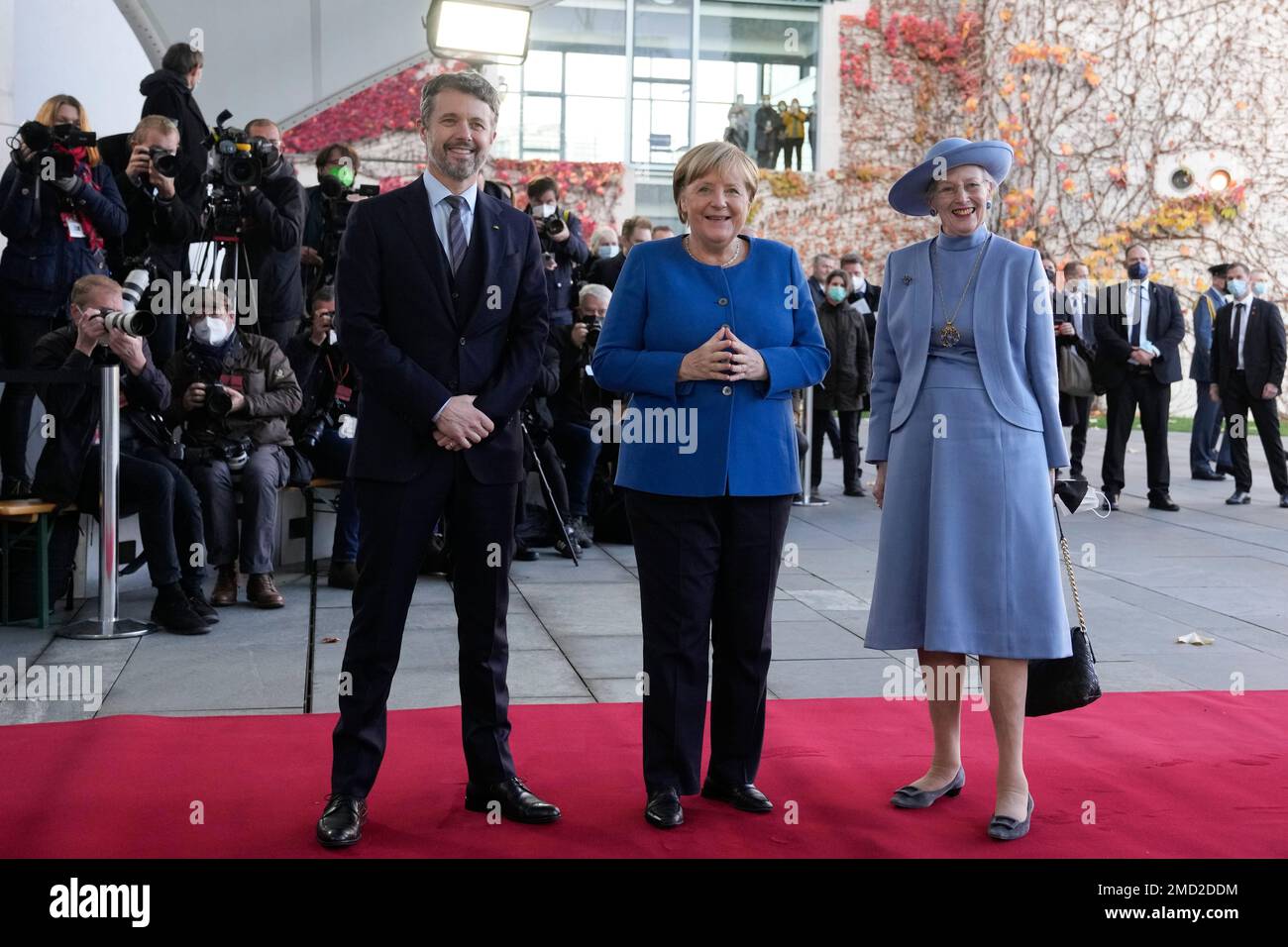German Chancellor Angela Merkel, center, welcomes Denmark's Queen ...