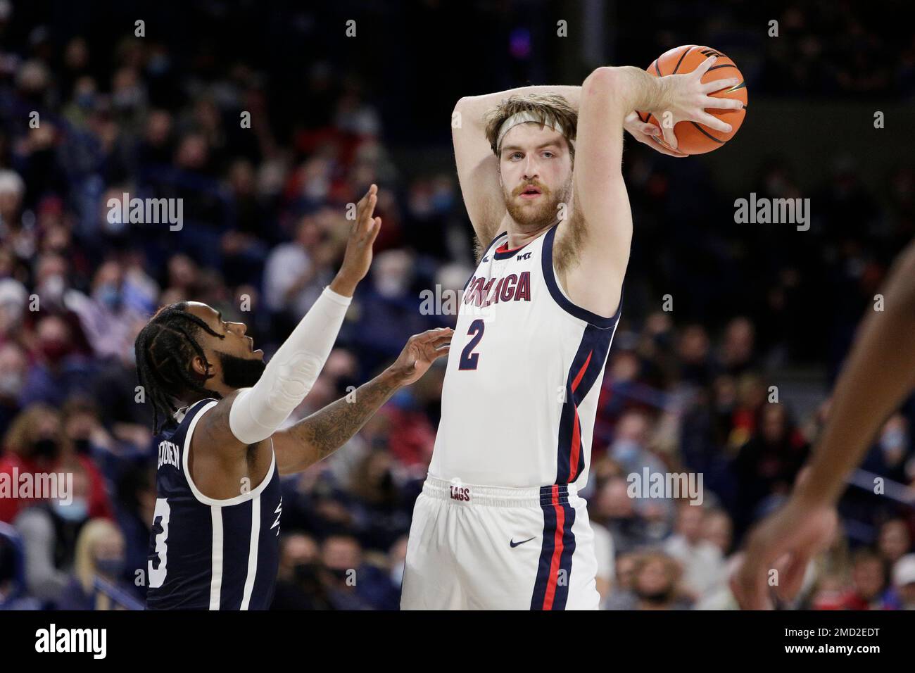 Gonzaga forward Drew Timme (2) controls the ball while defended by ...