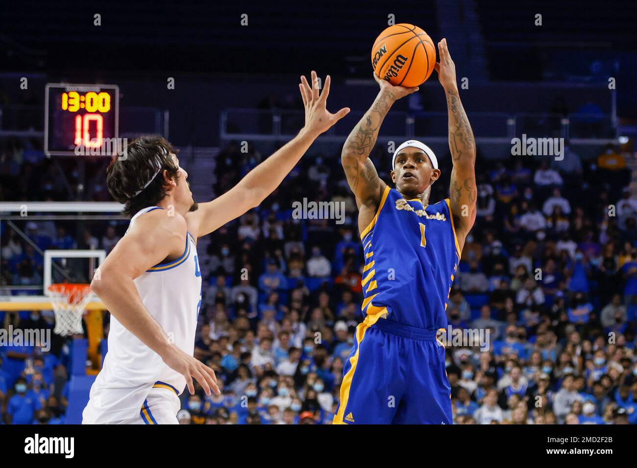 Cal State Bakersfield guard Shaun Williams (1) shoots over UCLA guard ...