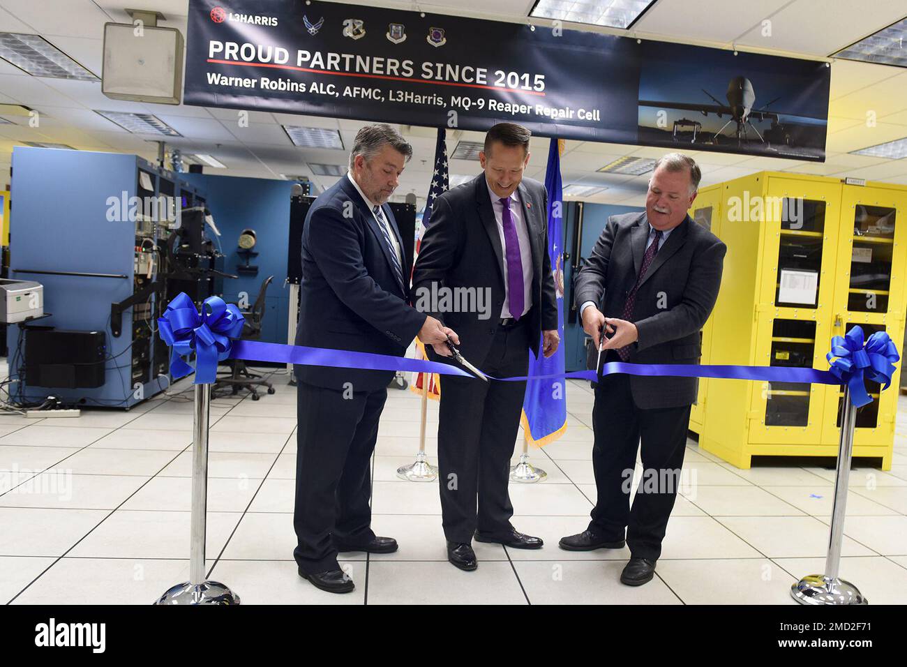 Thomas Courson, left, MQ-9 Sustainment chief, Ron Fehlen, center ...