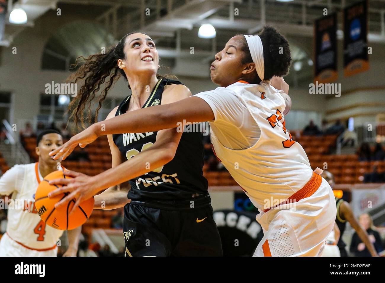 Wake Forest forward Christina Morra (23) looks to shoot defended by ...