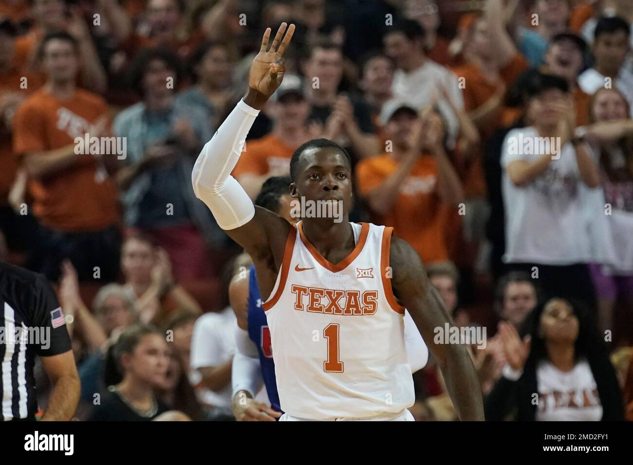 Texas guard Andrew Jones (1) celebrates a play during an NCAA college ...