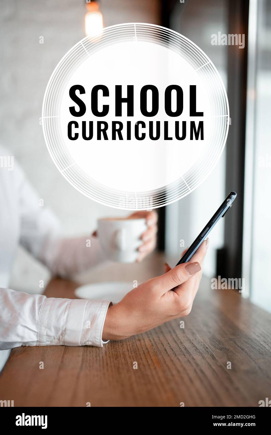 Sign displaying School Curriculum. Word for designed to provide ...
