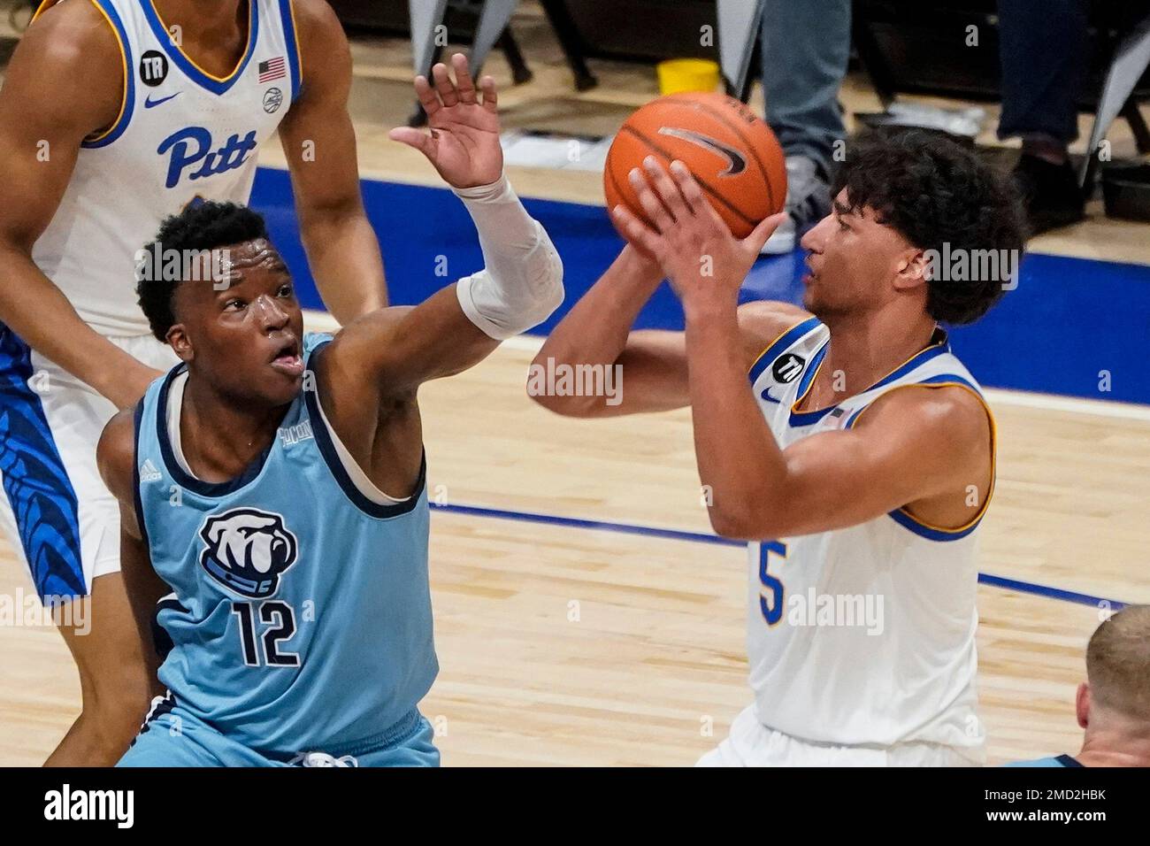 Pittsburgh's Nate Santos (5) shoots over Citadel's Brent Davis (12 ...