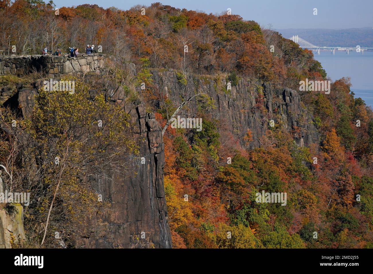 People enjoy the view and fall colors of the Palisades from a scenic ...
