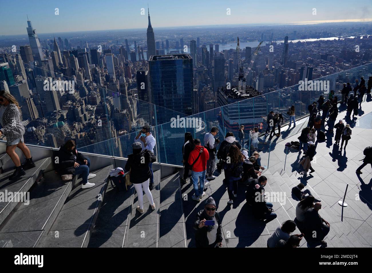 People take in the view from The Edge observation deck in New York ...