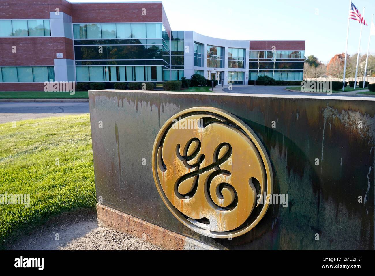 A General Electric logo rests outside a building, Tuesday, Nov. 9, 2021 ...