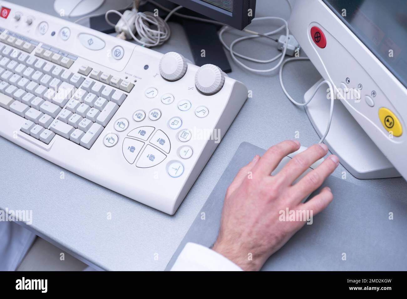 Doctor using laptop and electronic medical record (EMR) system. Digital ...