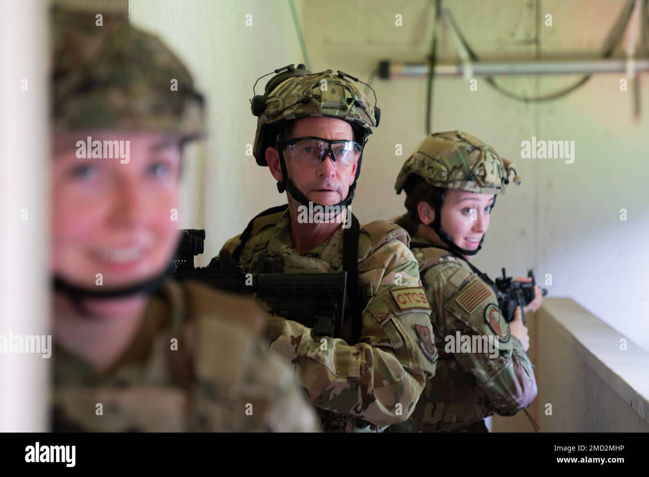 Col. John Robinson, center, 315th Airlift Wing commander, participates ...