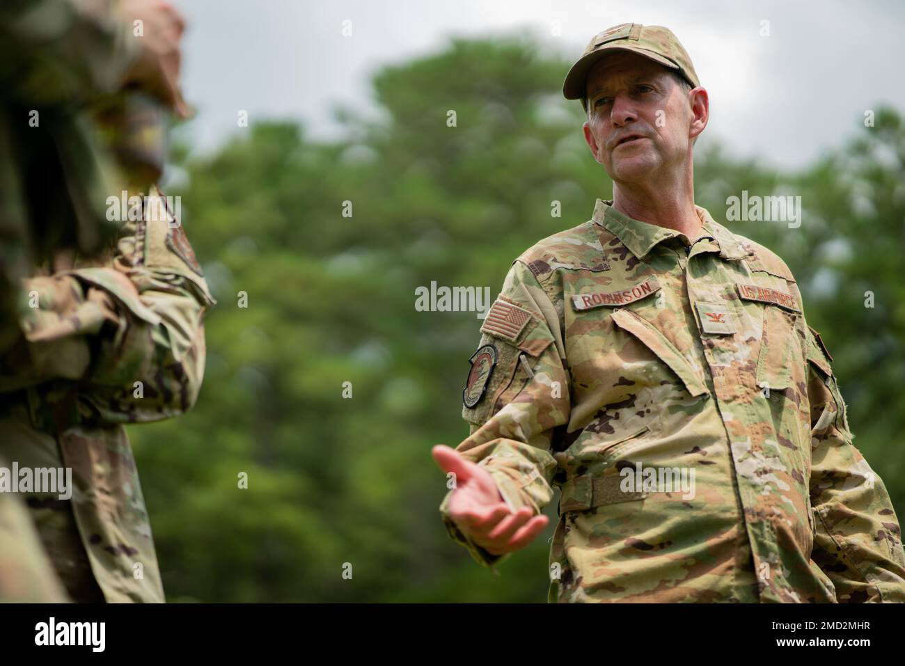 Col. John Robinson, 315th Airlift Wing commander, talks with members of ...