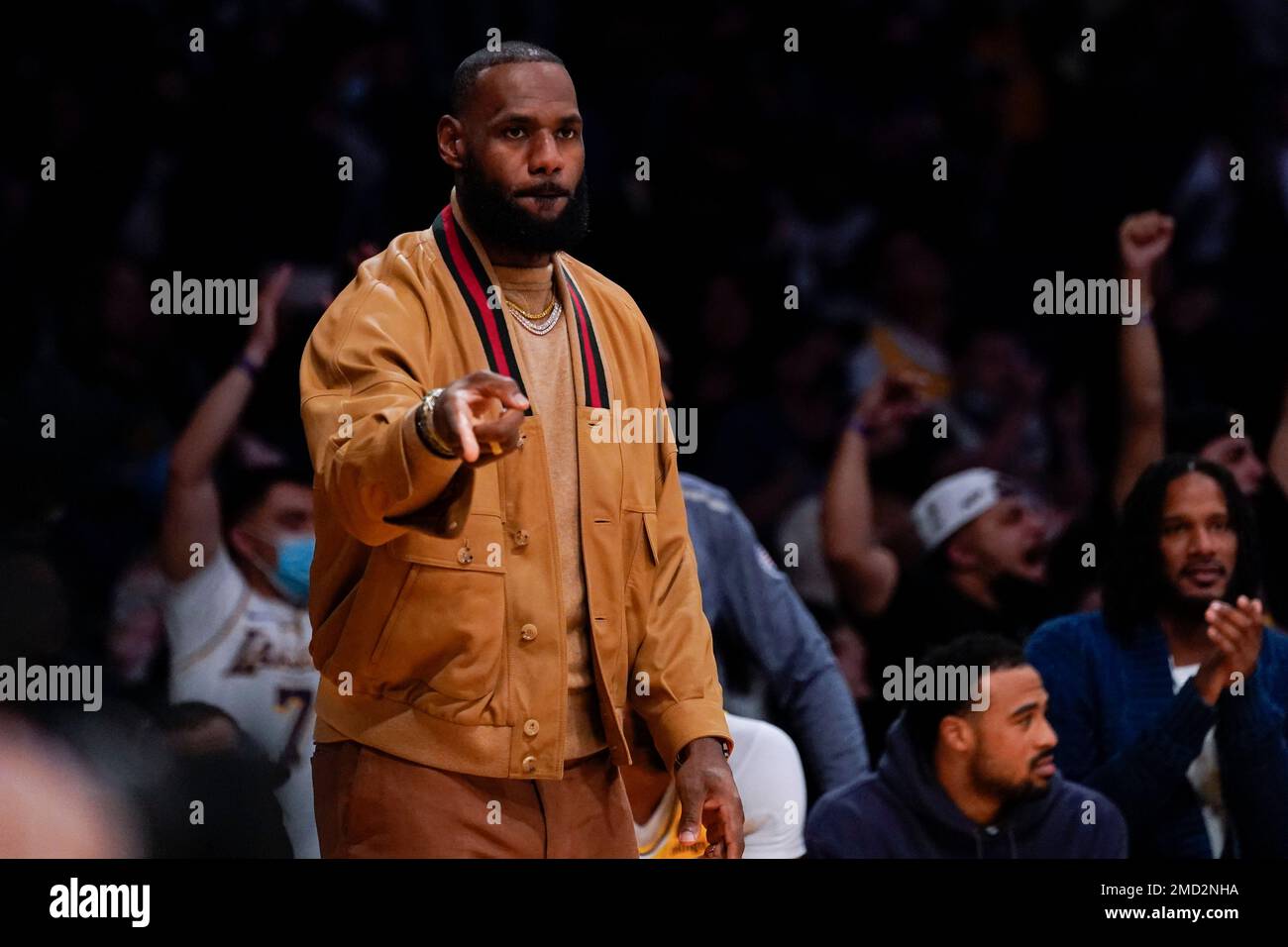 Los Angeles Lakers' LeBron James celebrates after a point during an NBA ...