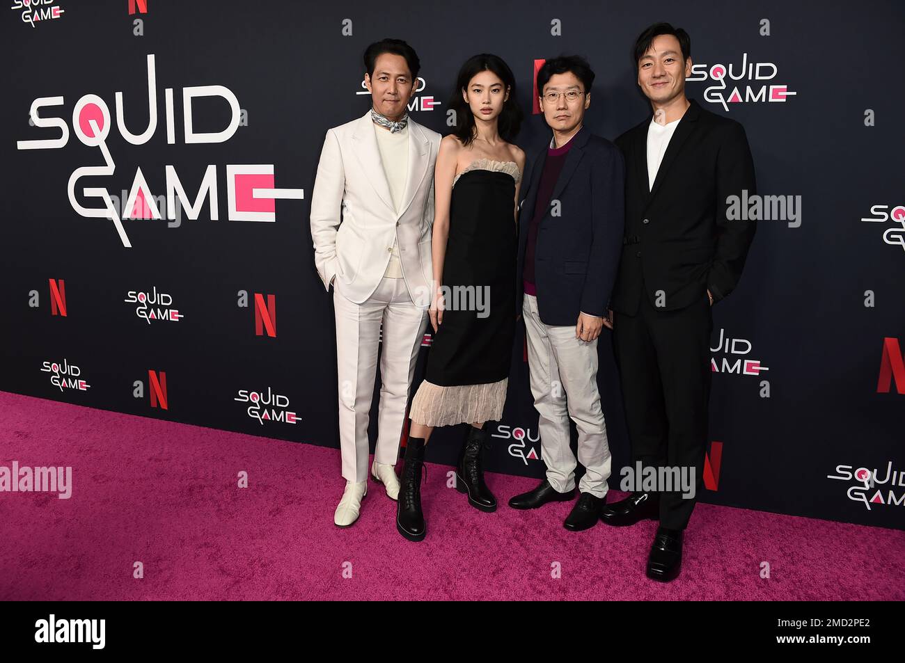 From left, Lee Jung-jae, Jung Hoyeon, Hwang Dong-hyuk and Park Hae Soo arrive at a red carpet ...