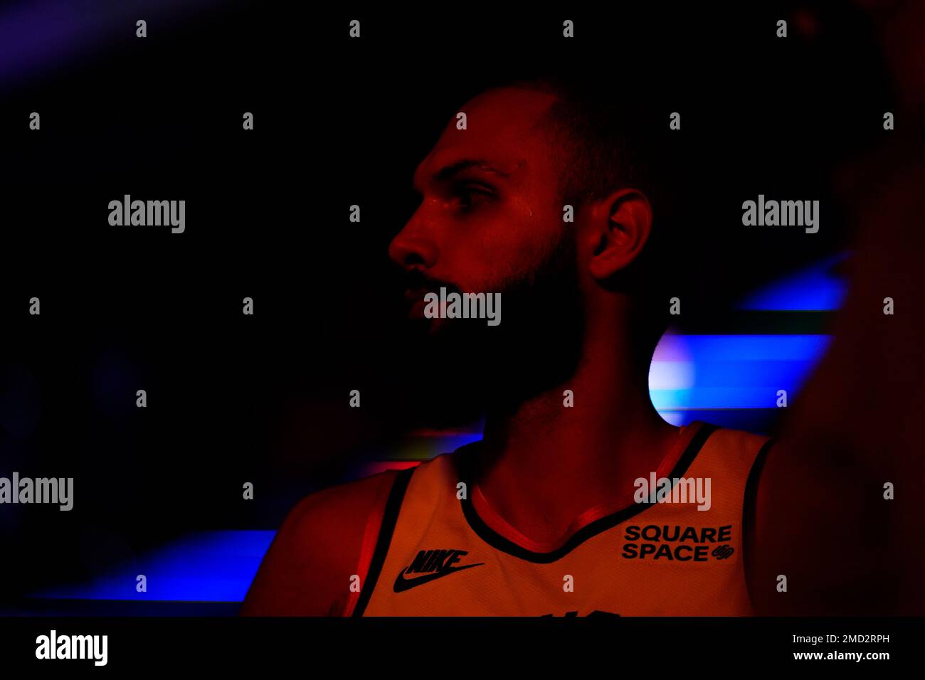 New York Knicks' Evan Fournier watches before an NBA basketball game ...