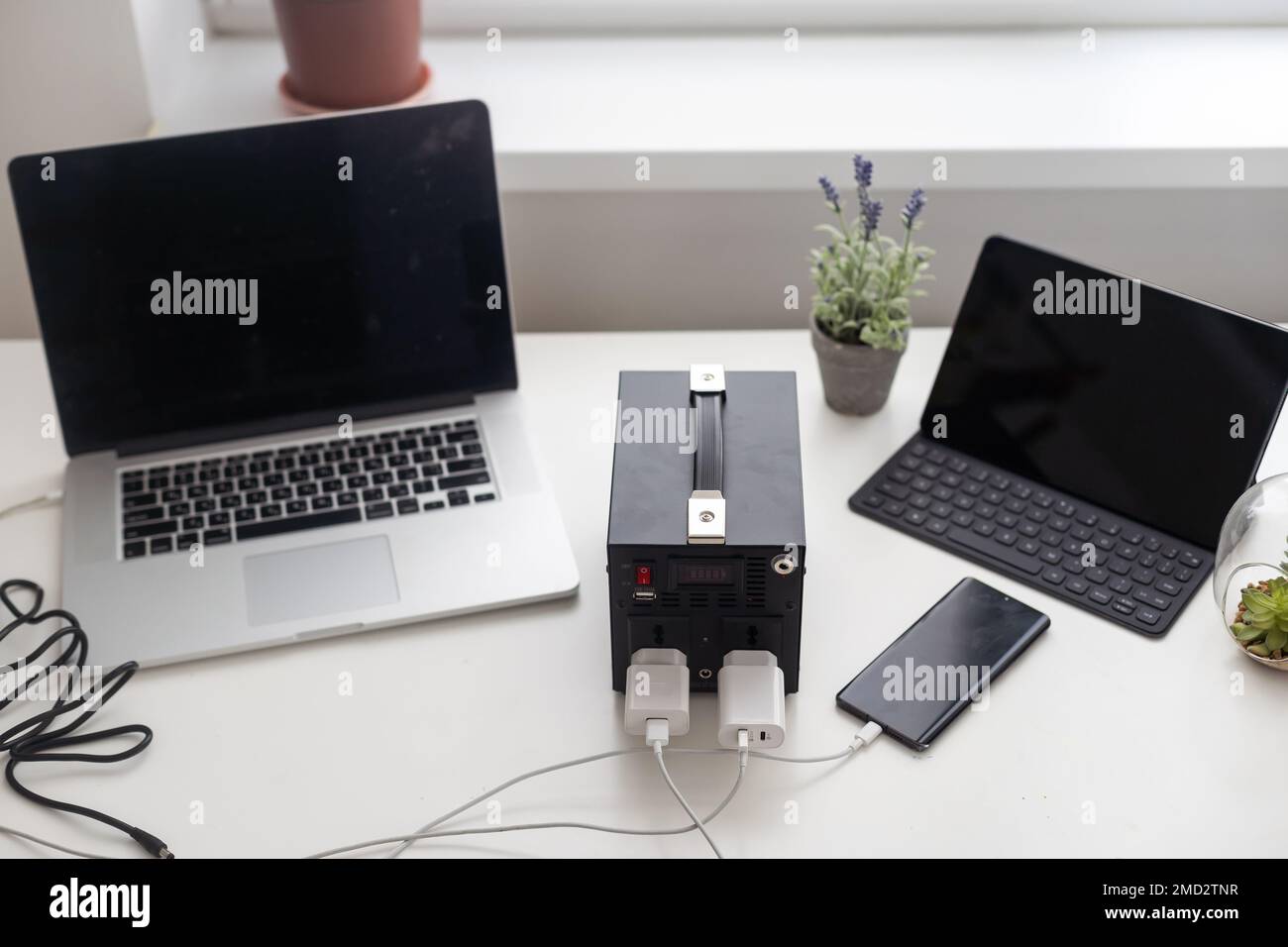 Portable multitasking charging station, power technology Stock Photo ...