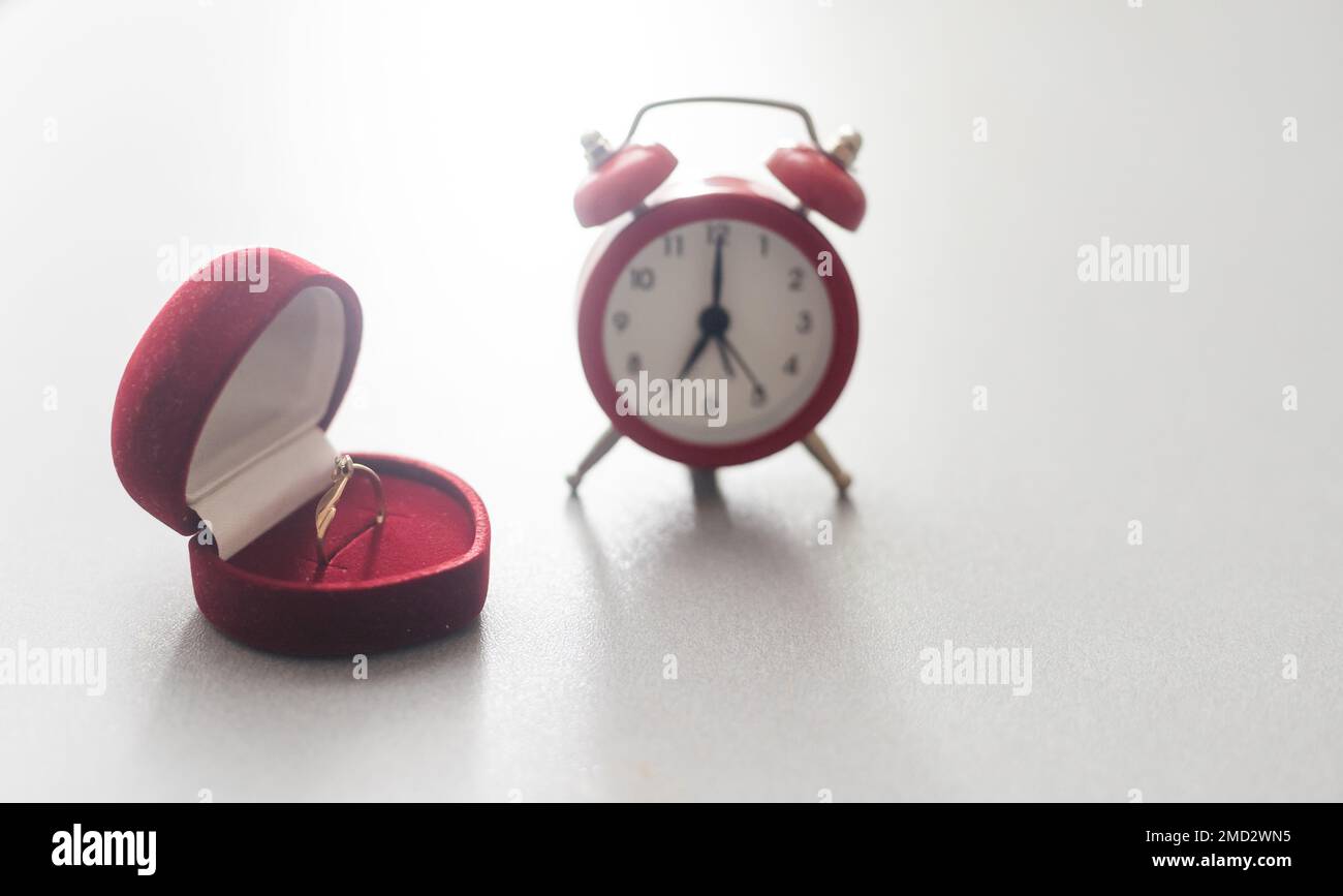Wedding rings alarm clock hi-res stock photography and images - Alamy