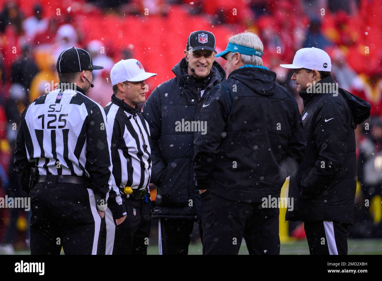 Referee Shawn Hochuli, second from left, and side judge Chad Hill (125 ...