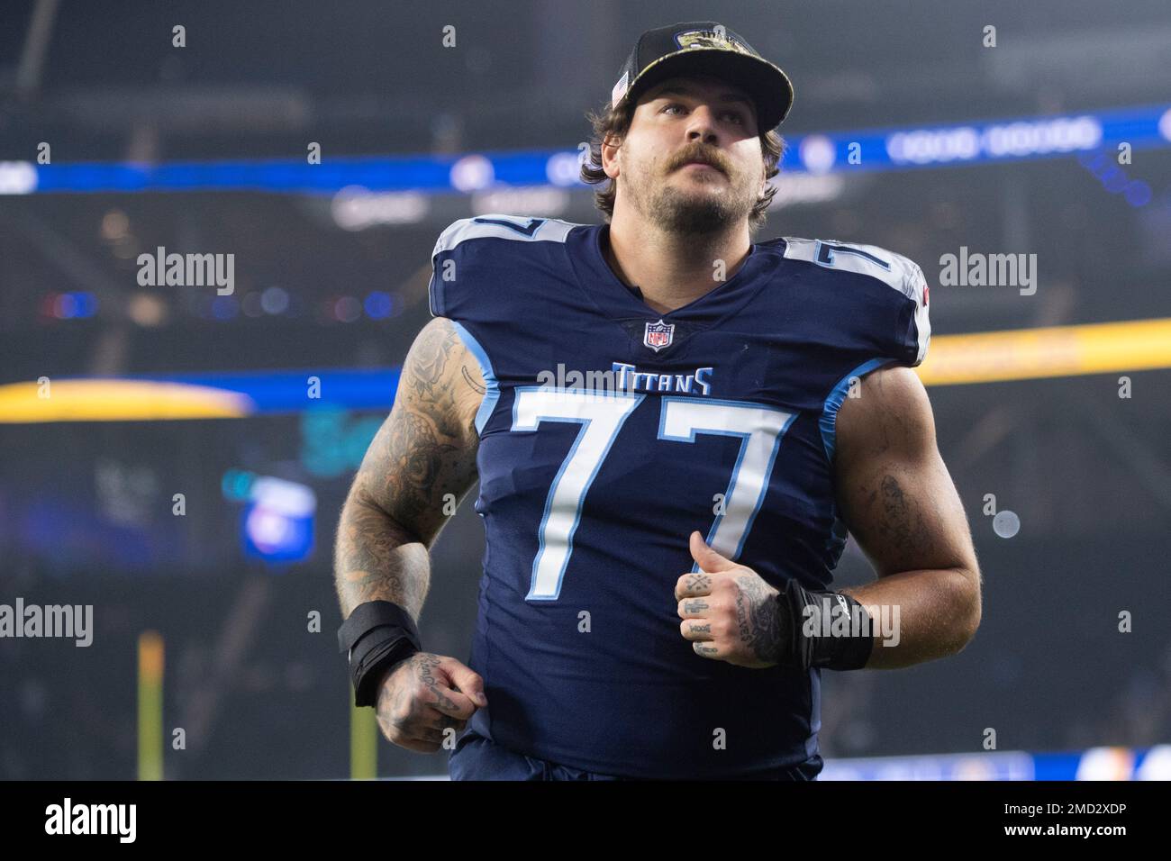 Tennessee Titans offensive tackle Taylor Lewan (77) walks back to the ...