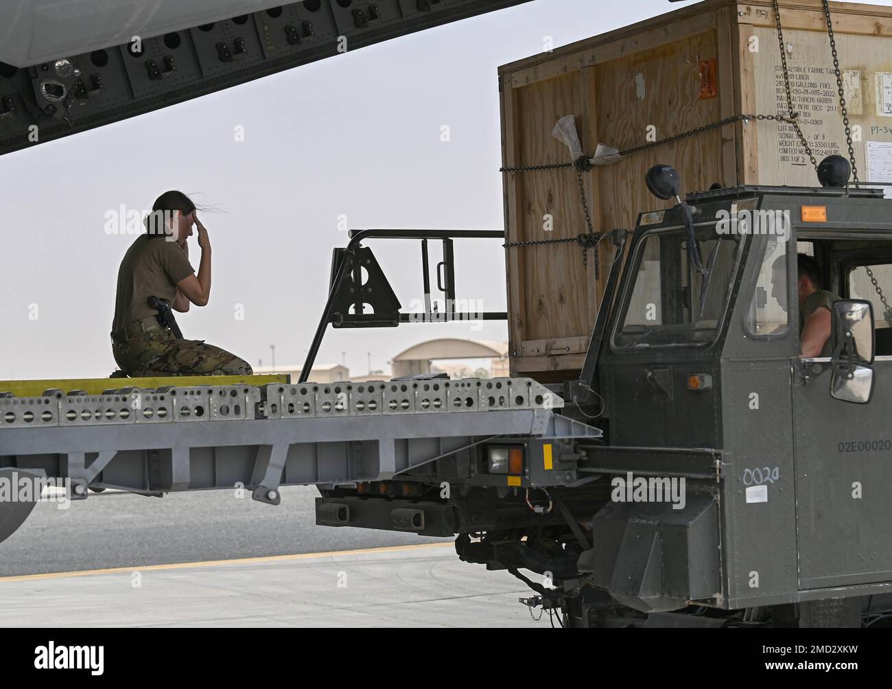 U.S. Air Force Senior Airman Nicole Snowden (left), an 816th Expeditionary Airlift Squadron ...