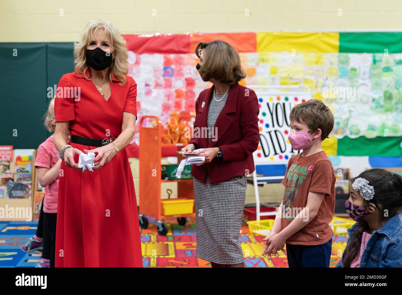 First lady Jill Biden is presented with a Rubik's Cube origami by ...
