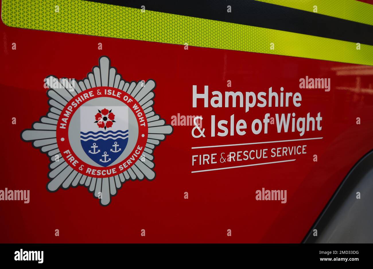 Hampshire and Isle of Wight Fire and Rescue service, badge on the side of a fire engine Stock ...