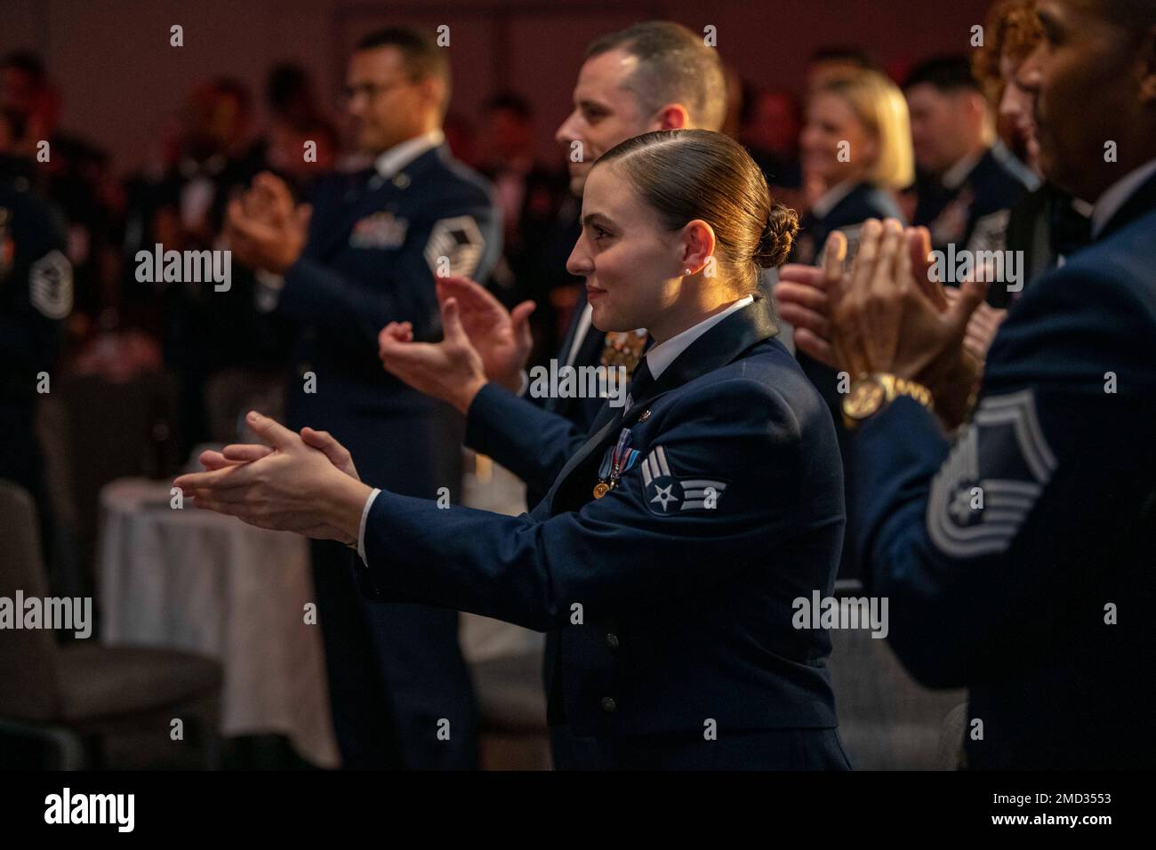 Reserve Citizen Airmen clap to honor Lt. Gen. Richard W. Scobee, Chief ...