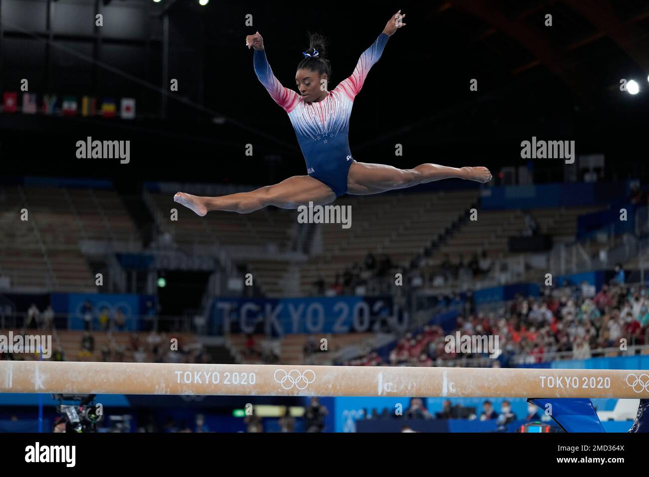 FILE - Simone Biles, of the United States, performs on the balance beam ...