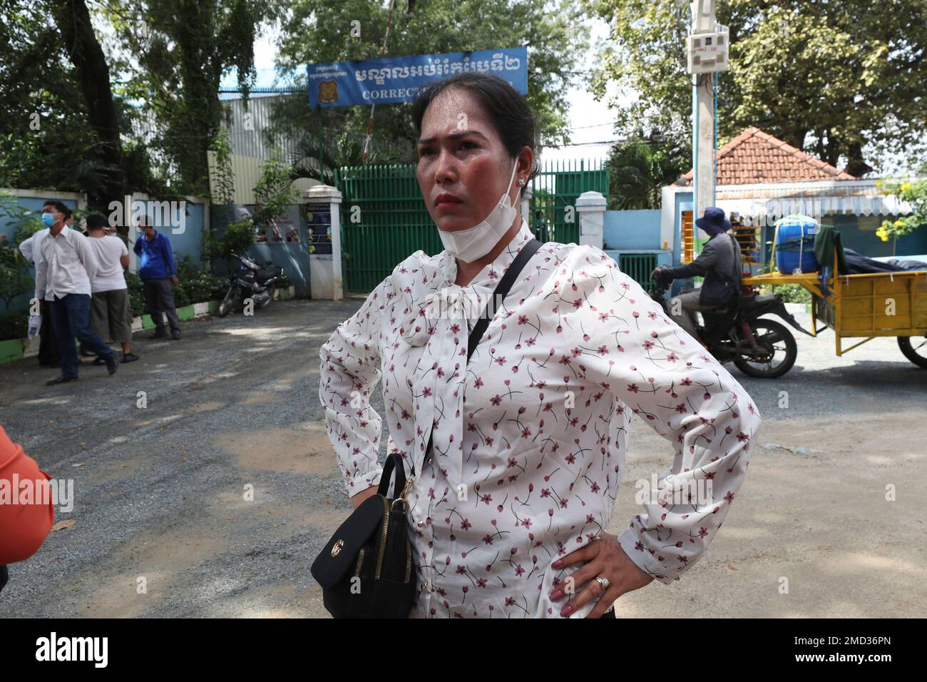 Prum Chantha, mother of imprisoned 16-year-old Kak Sovannchhay, stands ...