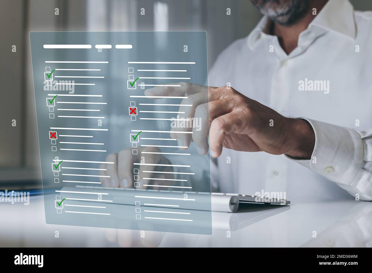 Man do online exam on virtual screen. Answer a survey filling out a ...