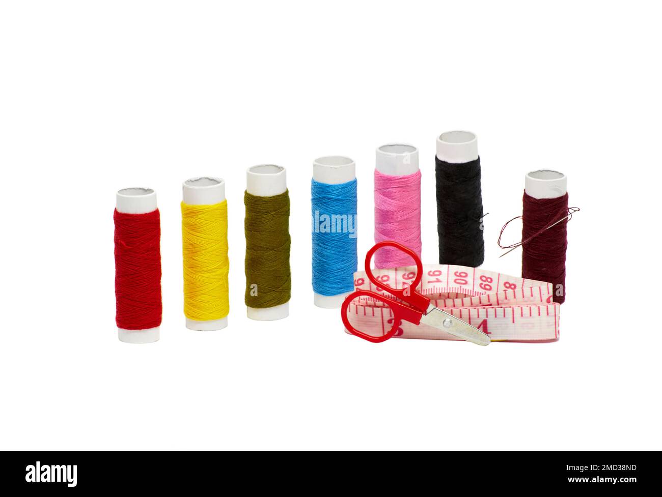 Image of seven spools of colored thread small scissors and centimeter ...