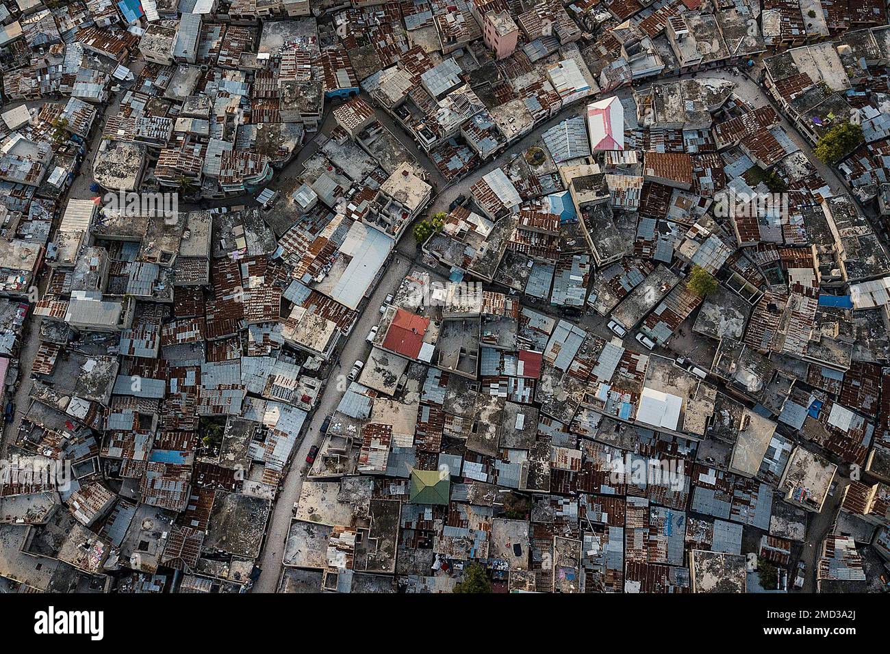 Homes stand densely packed at the gang-controlled Martissant ...