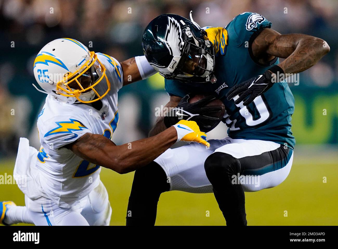 Philadelphia Eagles wide receiver Quez Watkins (16) is brought down by ...