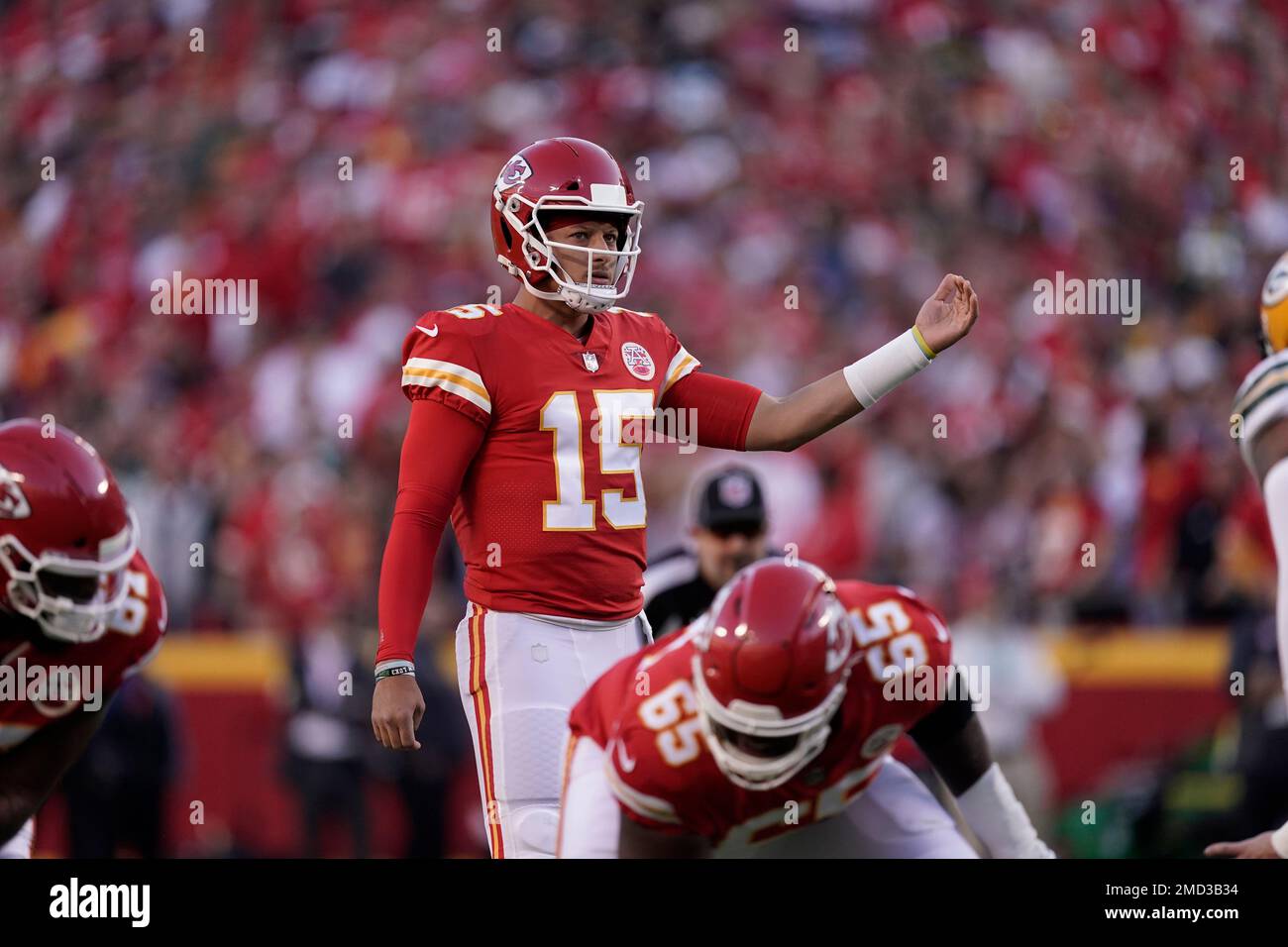 Kansas City Chiefs quarterback Patrick Mahomes motions on the line of ...