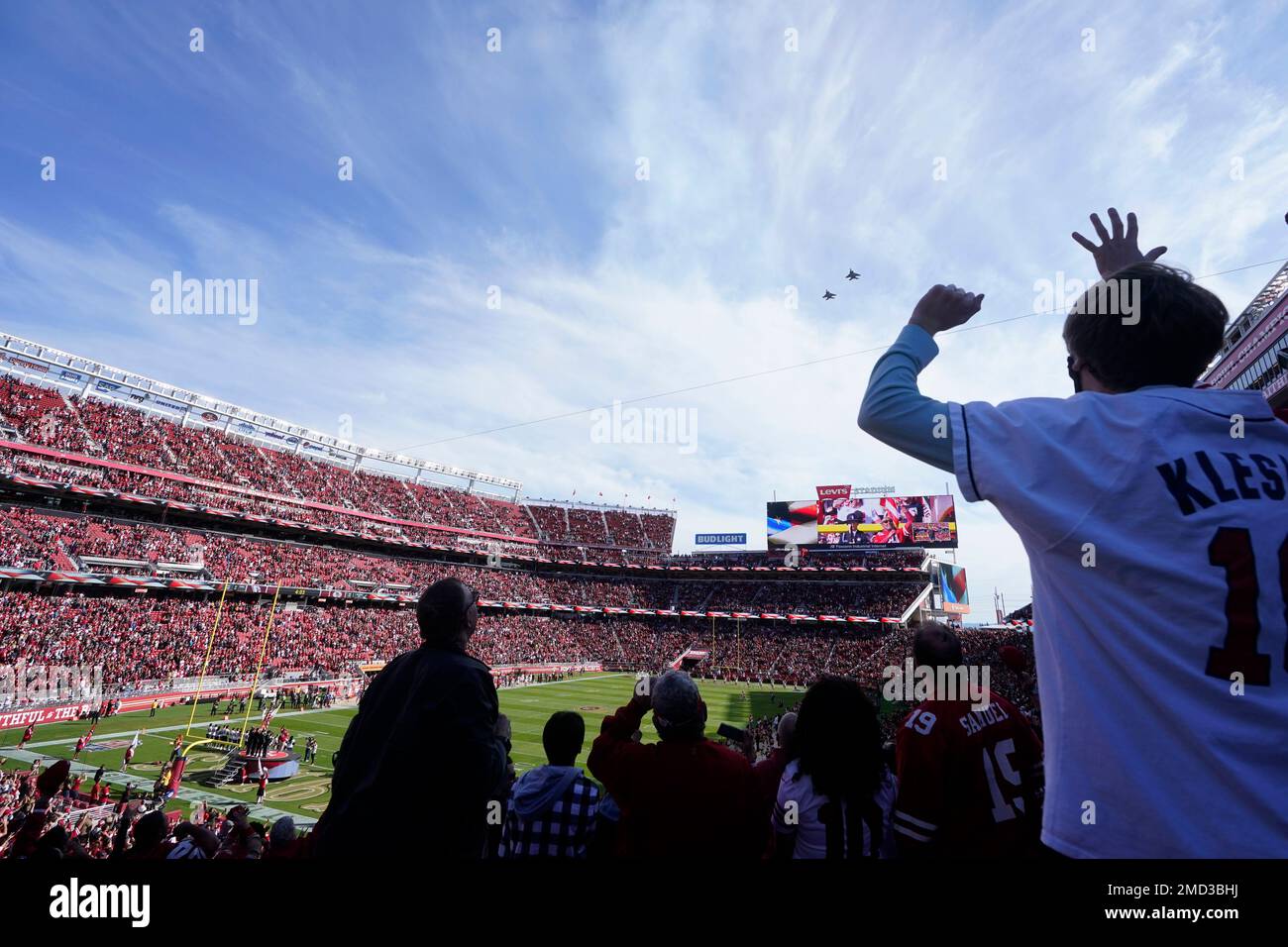 Fans cheer as planes fly over Levi's Stadium during the national anthem ...